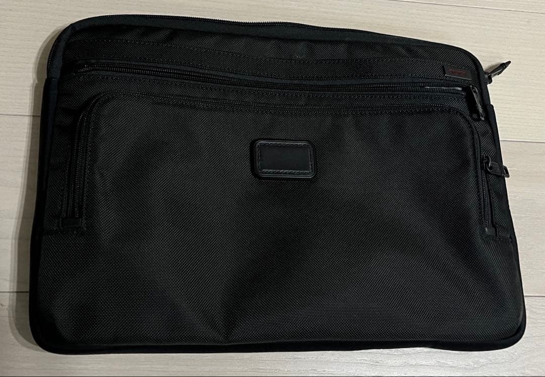 TUMI A4ラップトップケース - メルカリ